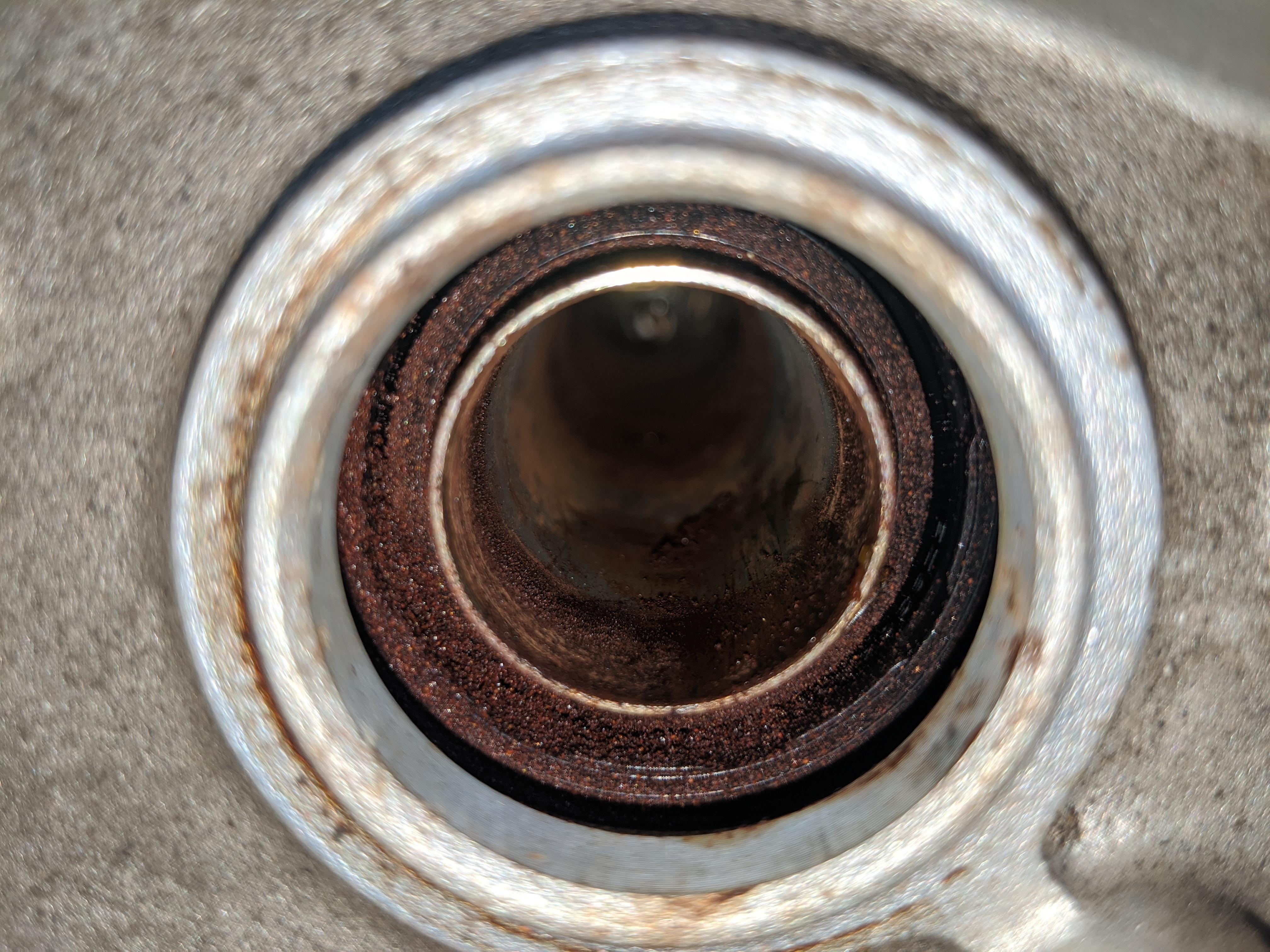 Rust Around The Spark Plug Tube
